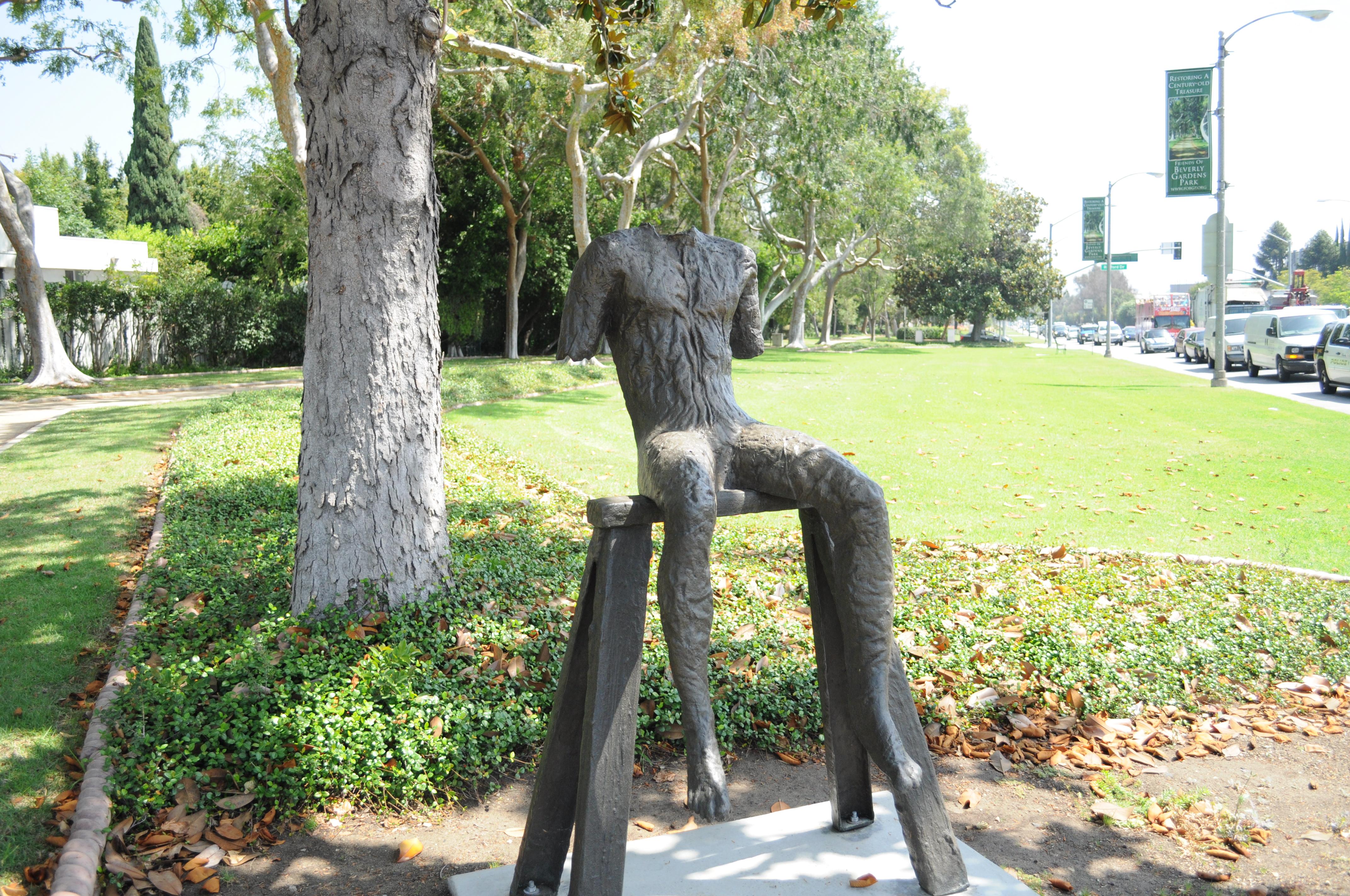 Sitting Figure on a Short Bench in Beverly Hills, CA